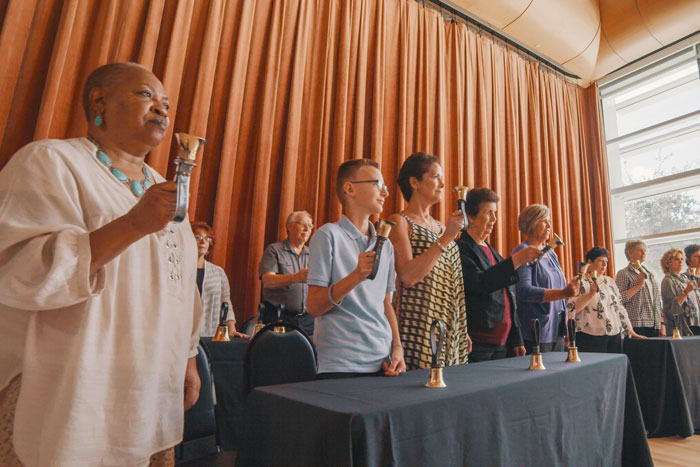 Local cancer survivors come together for bell choir performance through ...